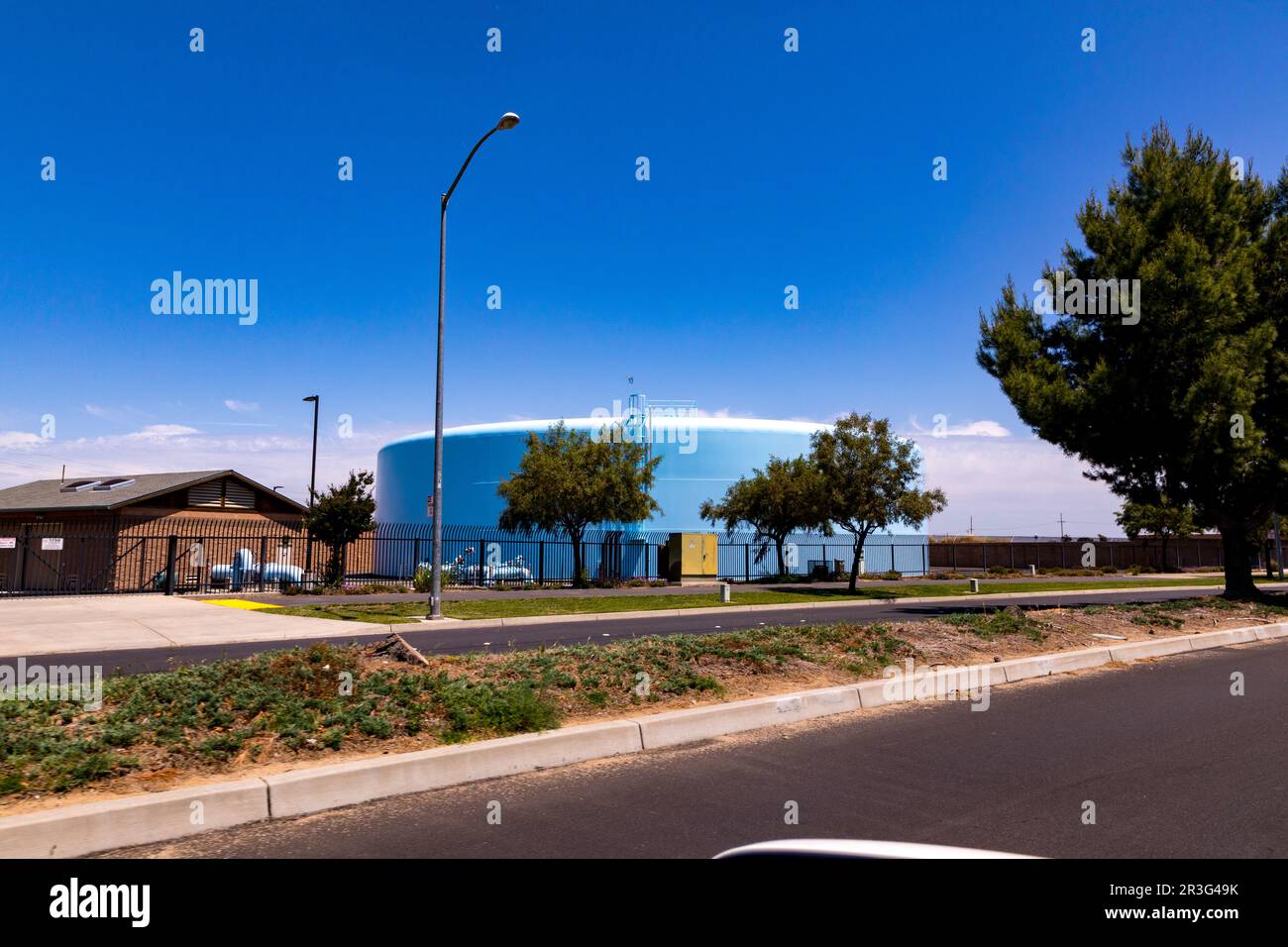A big blue water storage tank in Manteca California Stock Photo - Alamy
