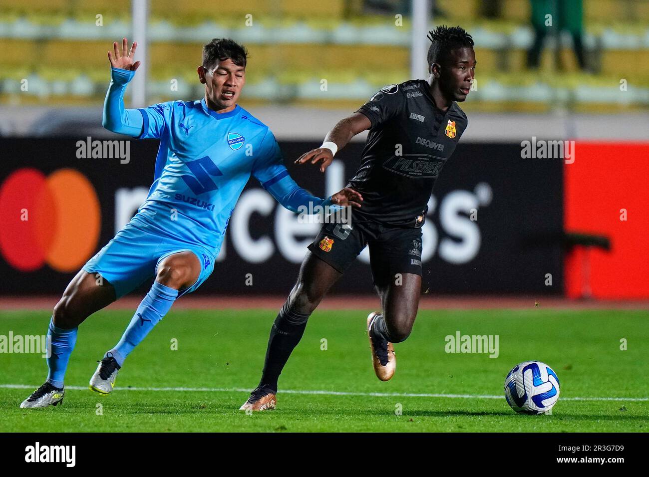 Jose Sagredo of Bolivia's Bolivar, left, and Adonis Preciado of Ecuador ...