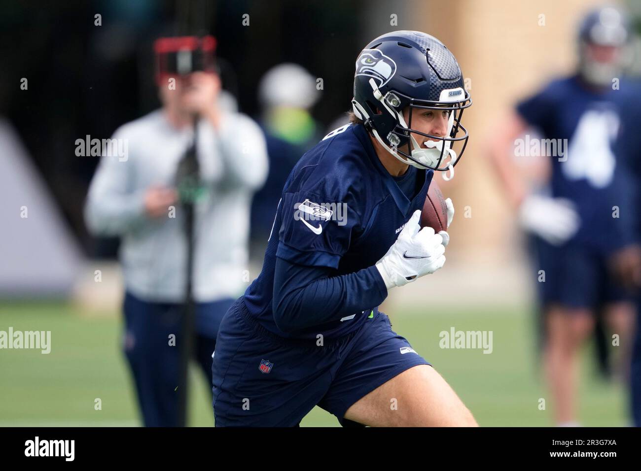 Seattle Seahawks wide receiver Jake Bobo (19) runs a drill Monday, May ...