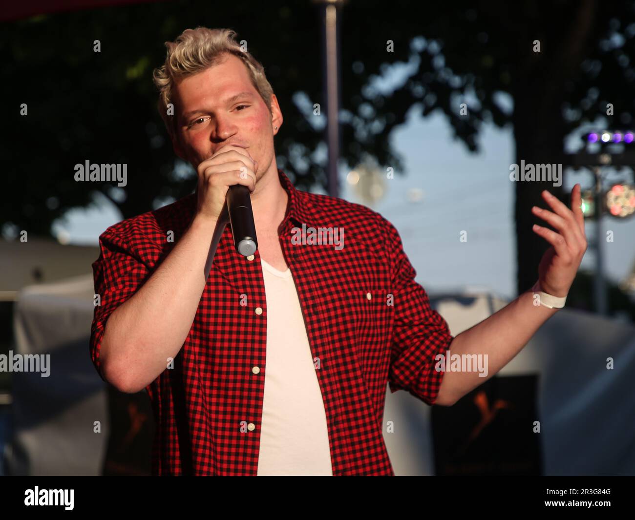 Singer KloÃŸ-Fritz performing at Magdeburg city festival Whitsun 2022 ...