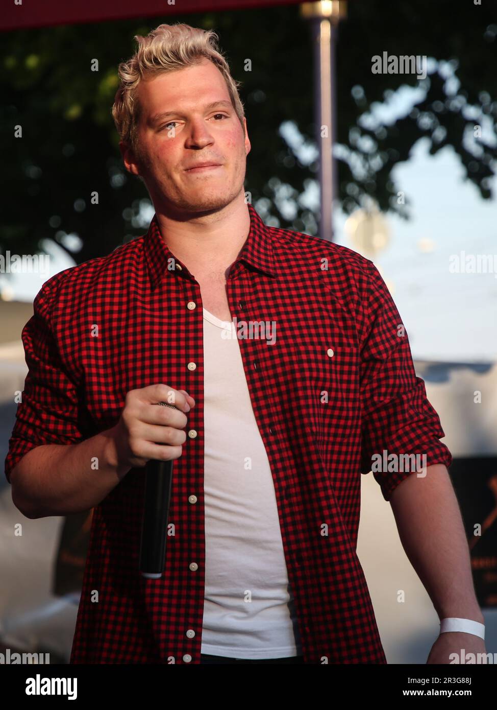 Singer KloÃŸ-Fritz performing at Magdeburg city festival Whitsun 2022 ...