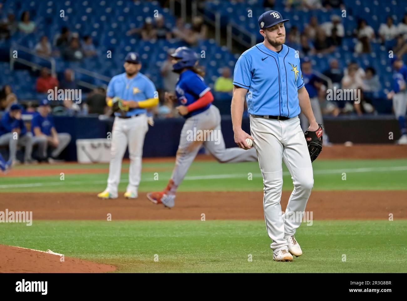 Tampa Bay Rays' Luke Raley walks behind the mound after giving up a ...