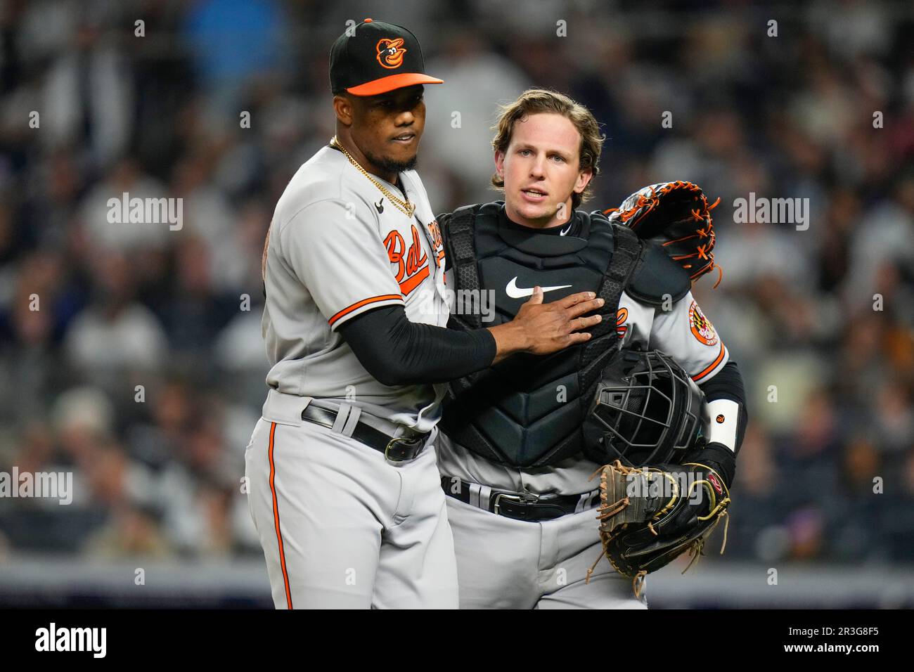 Baltimore Orioles relief pitcher Yennier Cano, left, embraces catcher ...