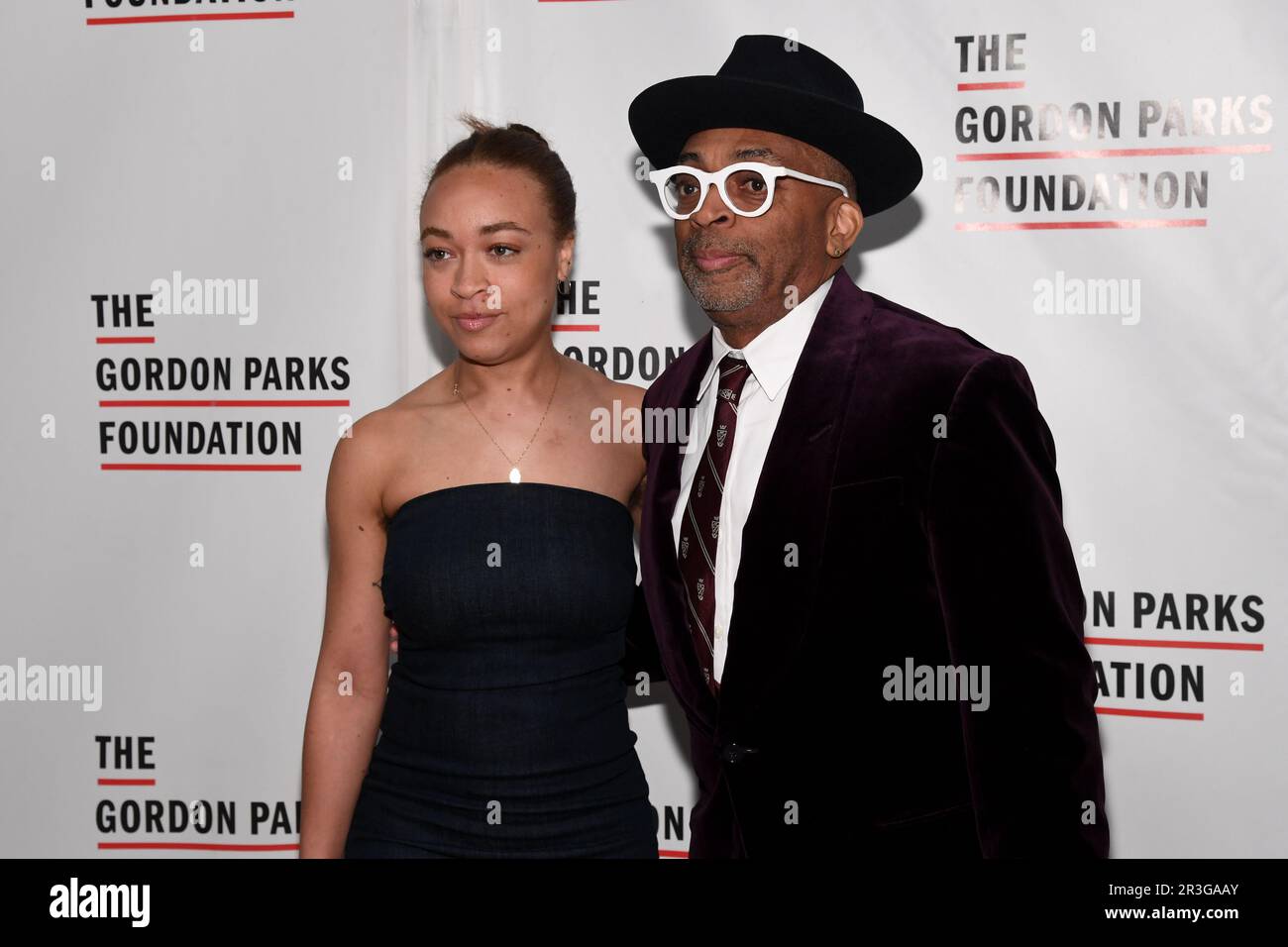 New York, USA. 23rd May, 2023. Satchel Lee and Spike Lee walking the ...