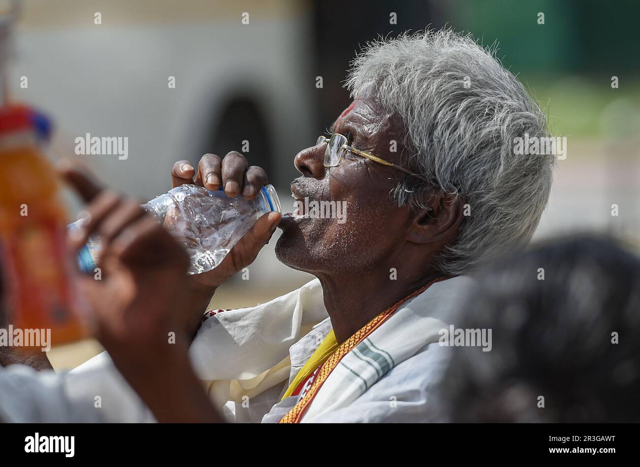 New Delhi India 23rd May 2023 A Man Quenches His Thirsty Amid A Heatwave In New Delhi India
