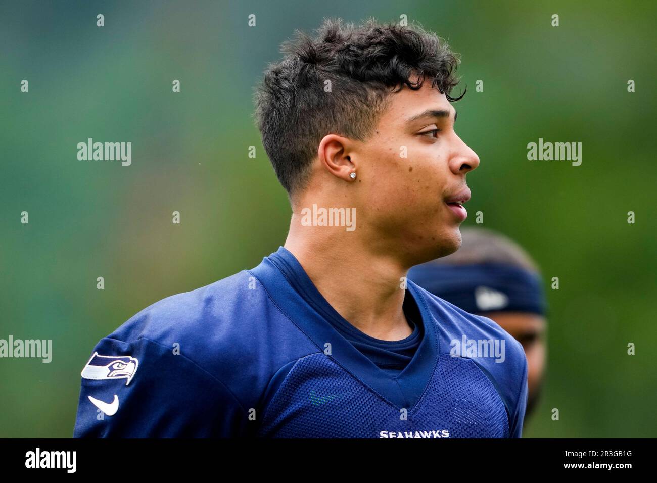Seattle Seahawks running back Zach Charbonnet walks off the field ...