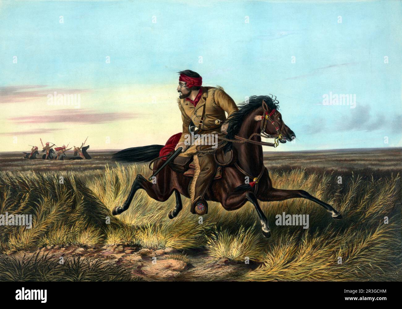 A man on a horse in the middle of prairie with a group of riders ...