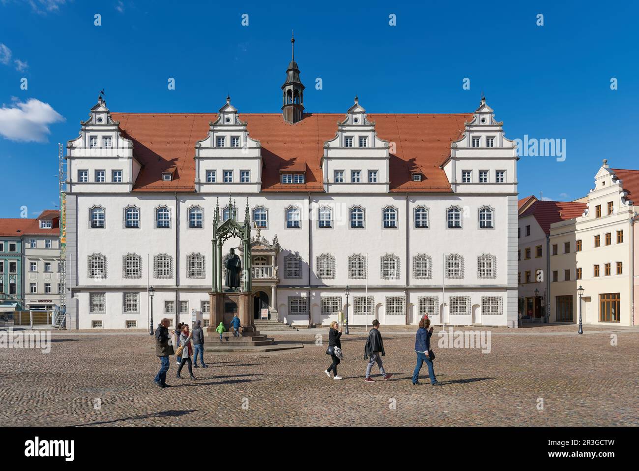 City Hall of Wittenberg with the monument of the reformer Martin Luther ...