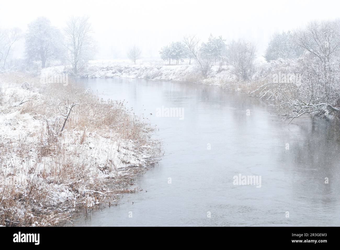 Winter river in snow Stock Photo - Alamy