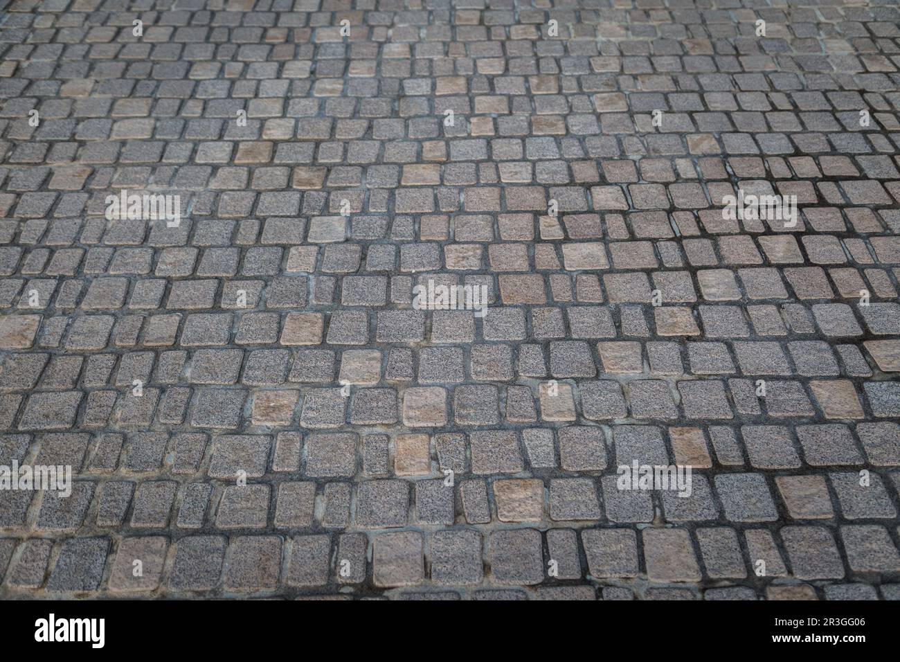 Cobblestone pavement texture background Stock Photo - Alamy