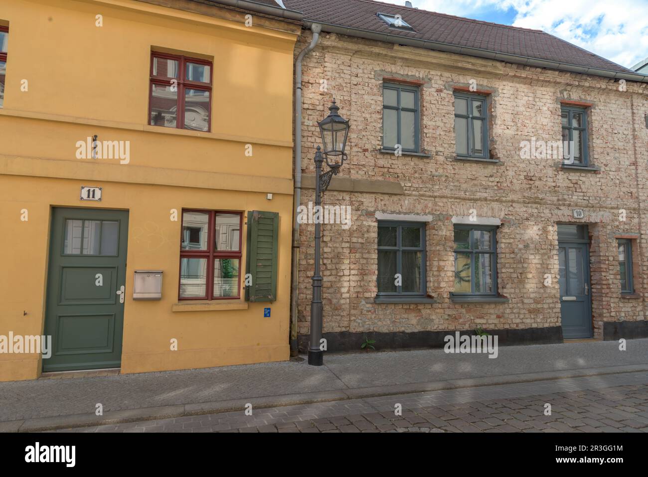 Two houses in one street, one with new and one with old facade Stock ...