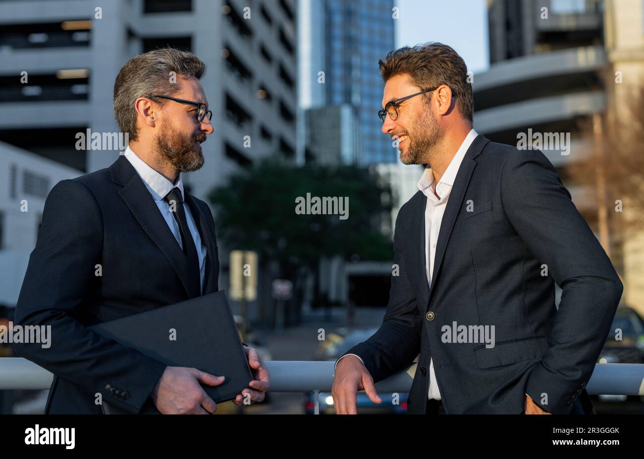 Middle aged businessman discussing contract hi-res stock photography ...