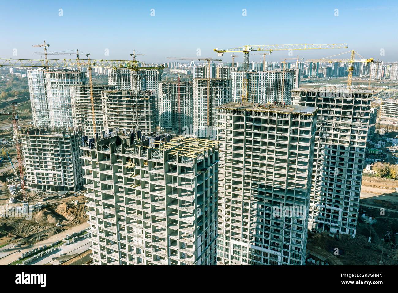 aerial view of a large construction site with multistory residential ...