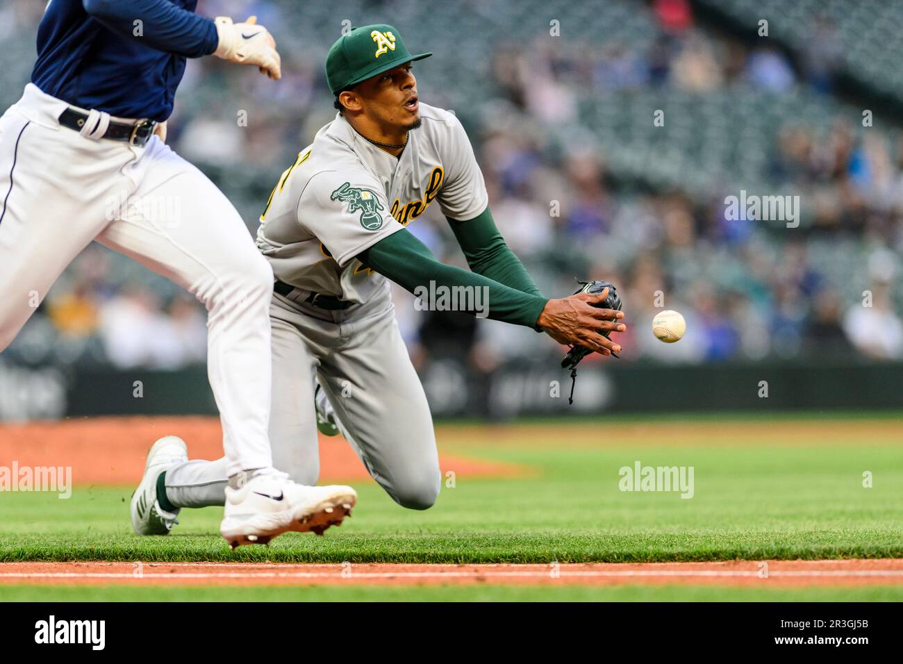 Oakland Athletics starting pitcher Luis Medina scrambles to throw out ...