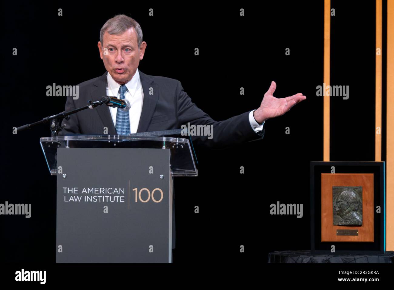 Supreme Court Chief Justice John Roberts speaks as her receives the ...