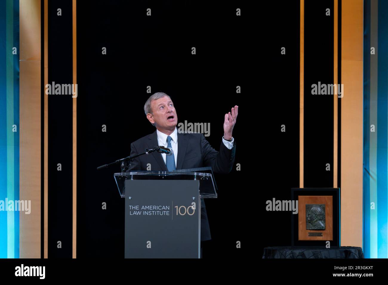 Supreme Court Chief Justice John Roberts speaks as her receives the ...