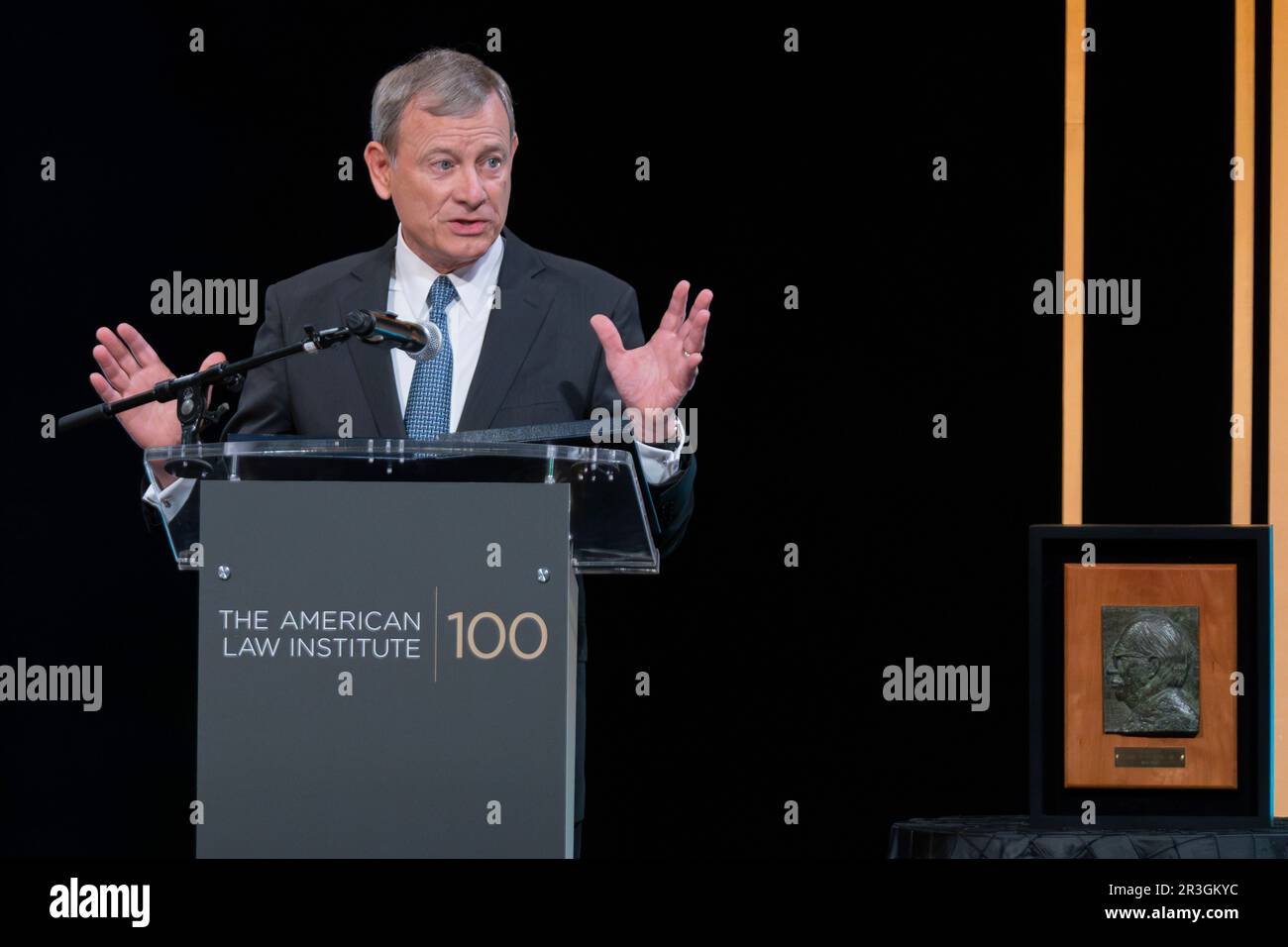 Supreme Court Chief Justice John Roberts speaks as her receives the ...