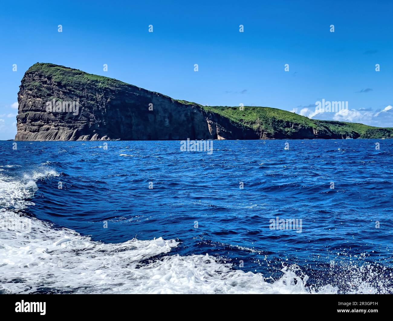 View of steep cliffs from Isle de Coin de Mire Gunner's Coin Island of ...