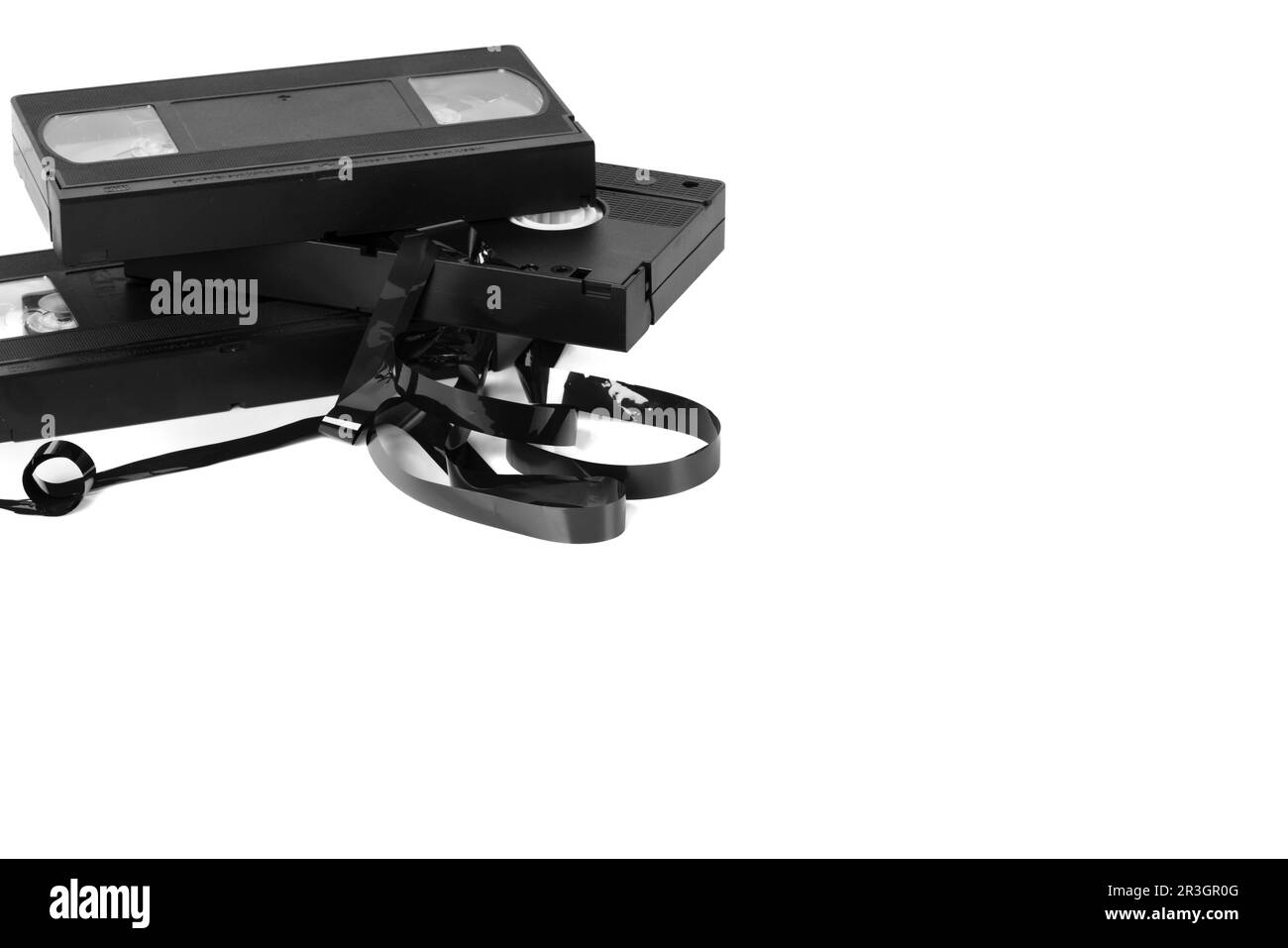 Defective VHS, cassettes, tape spaghetti, white background, copying ...