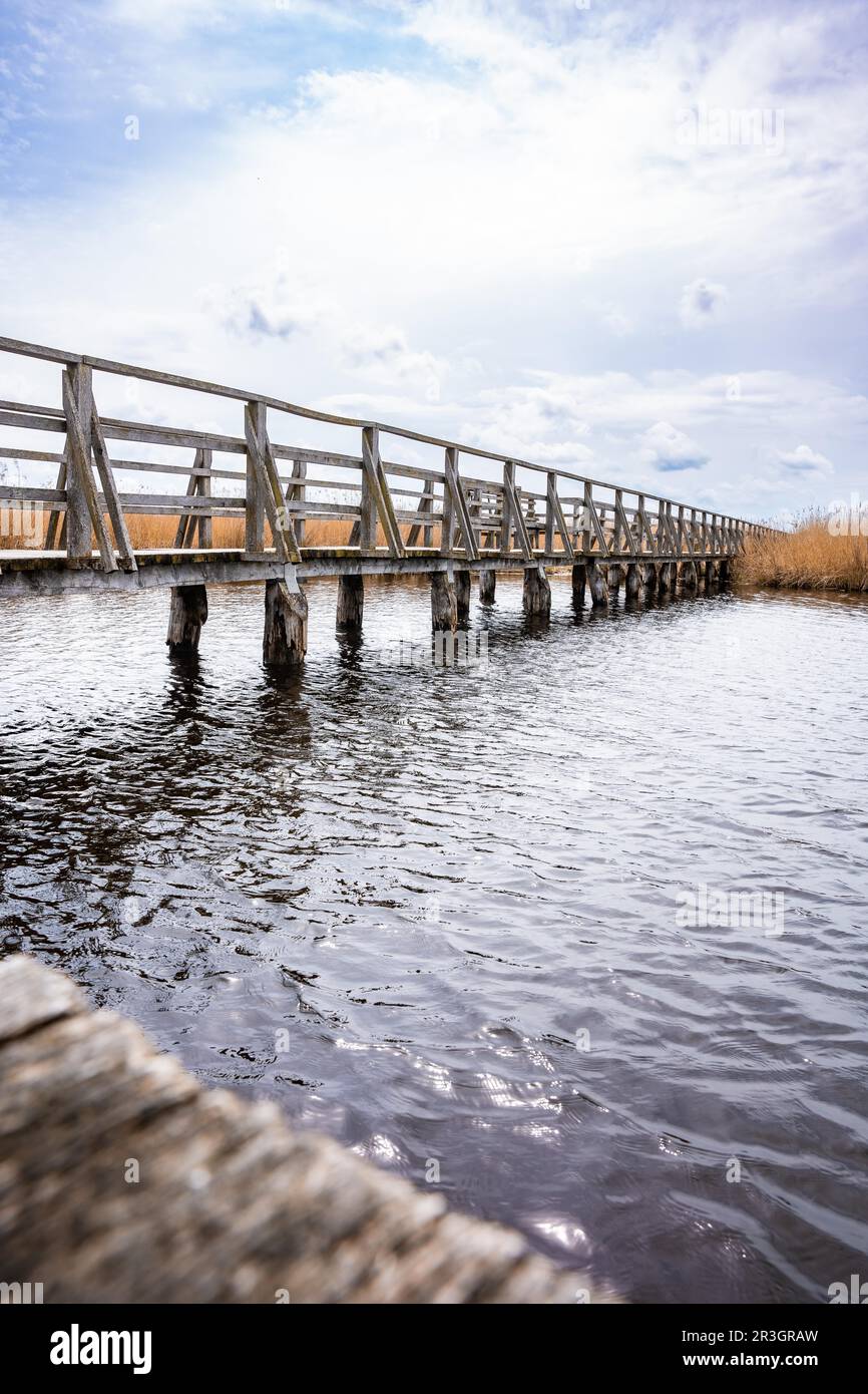 Footbridge on the lake with reeds, Unesco World Heritage Site ...