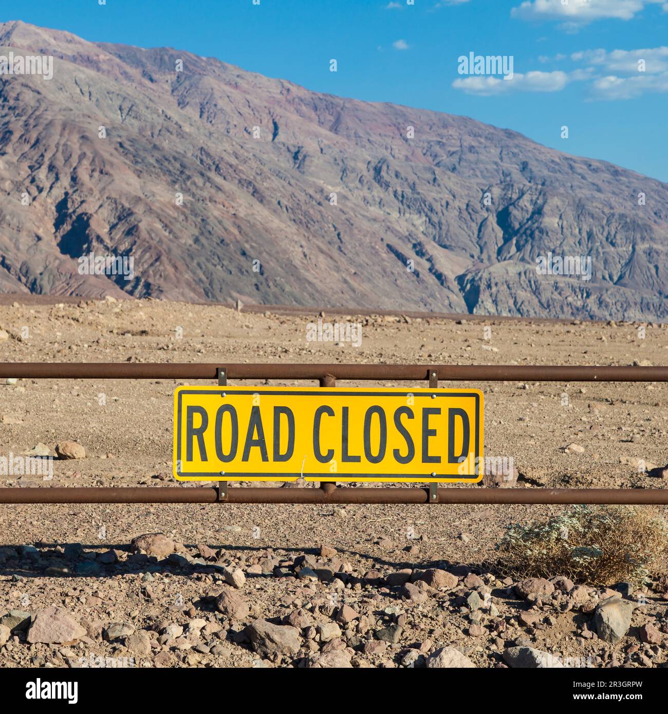 Death Valley, California. Road Closed sign in the middle of the desert ...