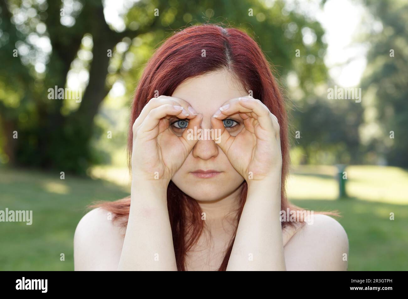 Fingers around eyes hi-res stock photography and images - Alamy