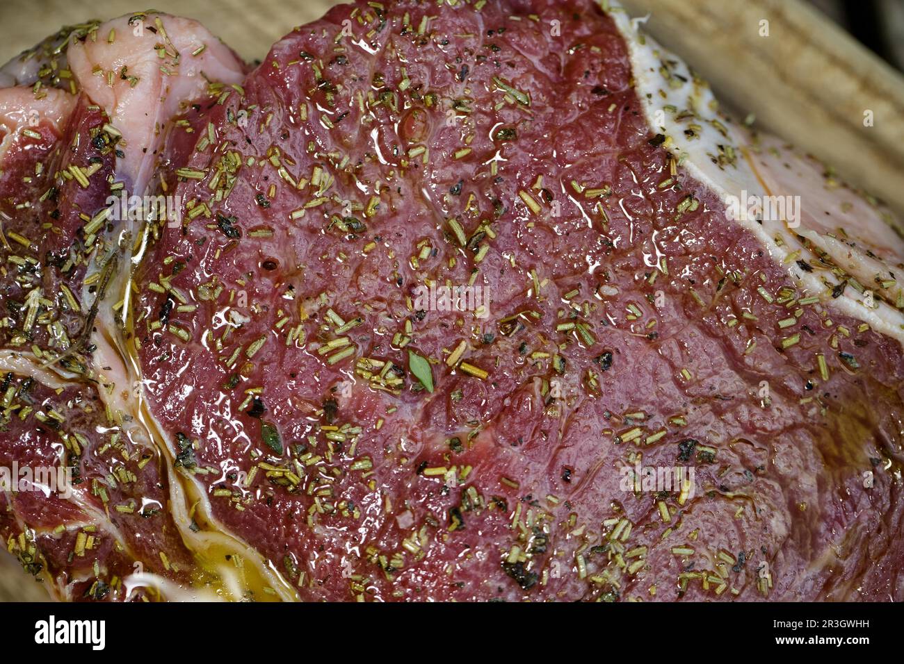 Seasoned fresh beef chop ready yum grilling Stock Photo - Alamy