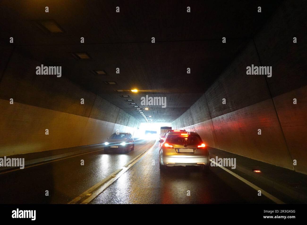 Car ride through a road tunnel Stock Photo - Alamy