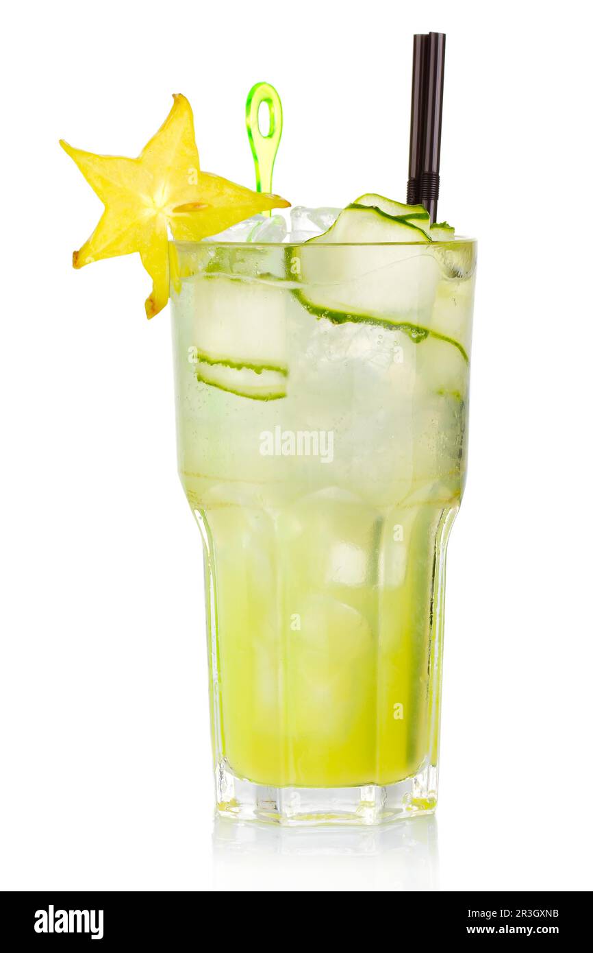 Green alcohol cocktail with carabola and cucumber slices isolated on ...