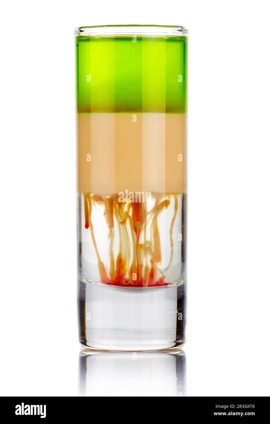 Shot sliced alcohol cocktail with drops isolated on white background ...