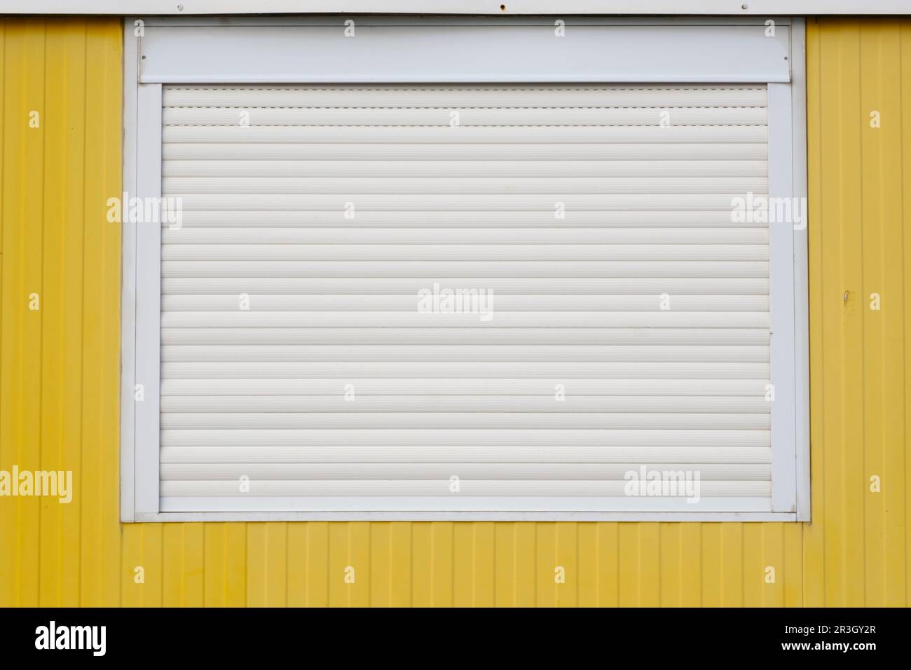 Window with closed roller shutter Stock Photo - Alamy