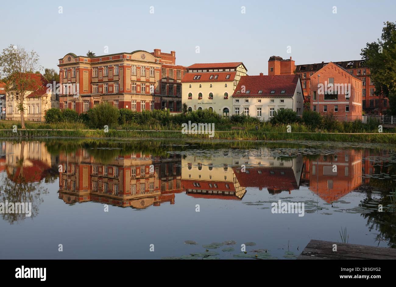 Dosse pond and old buildings in Wittstock Stock Photo - Alamy