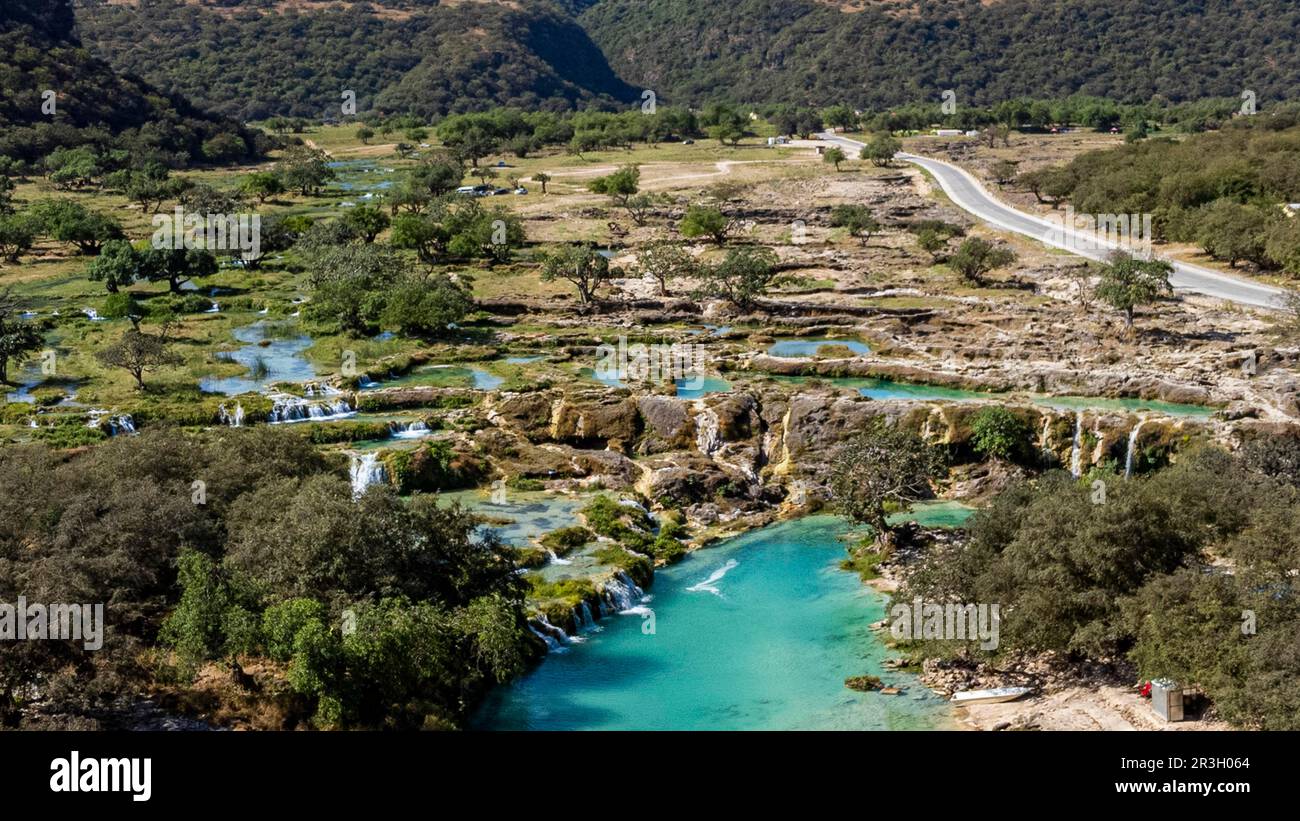 Aerial of turquoise waterfalls, Wadi Darbat, Salalah, Oman Stock Photo ...