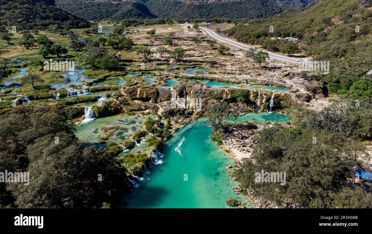 Aerial of turquoise waterfalls, Wadi Darbat, Salalah, Oman Stock Photo ...