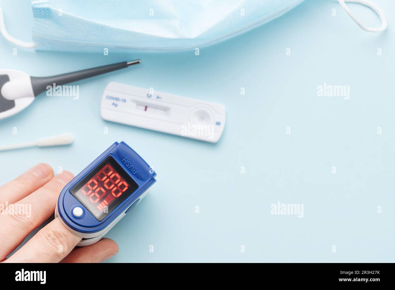 Pulse oximeter measuring oxygen saturation in blood and heart rate ...