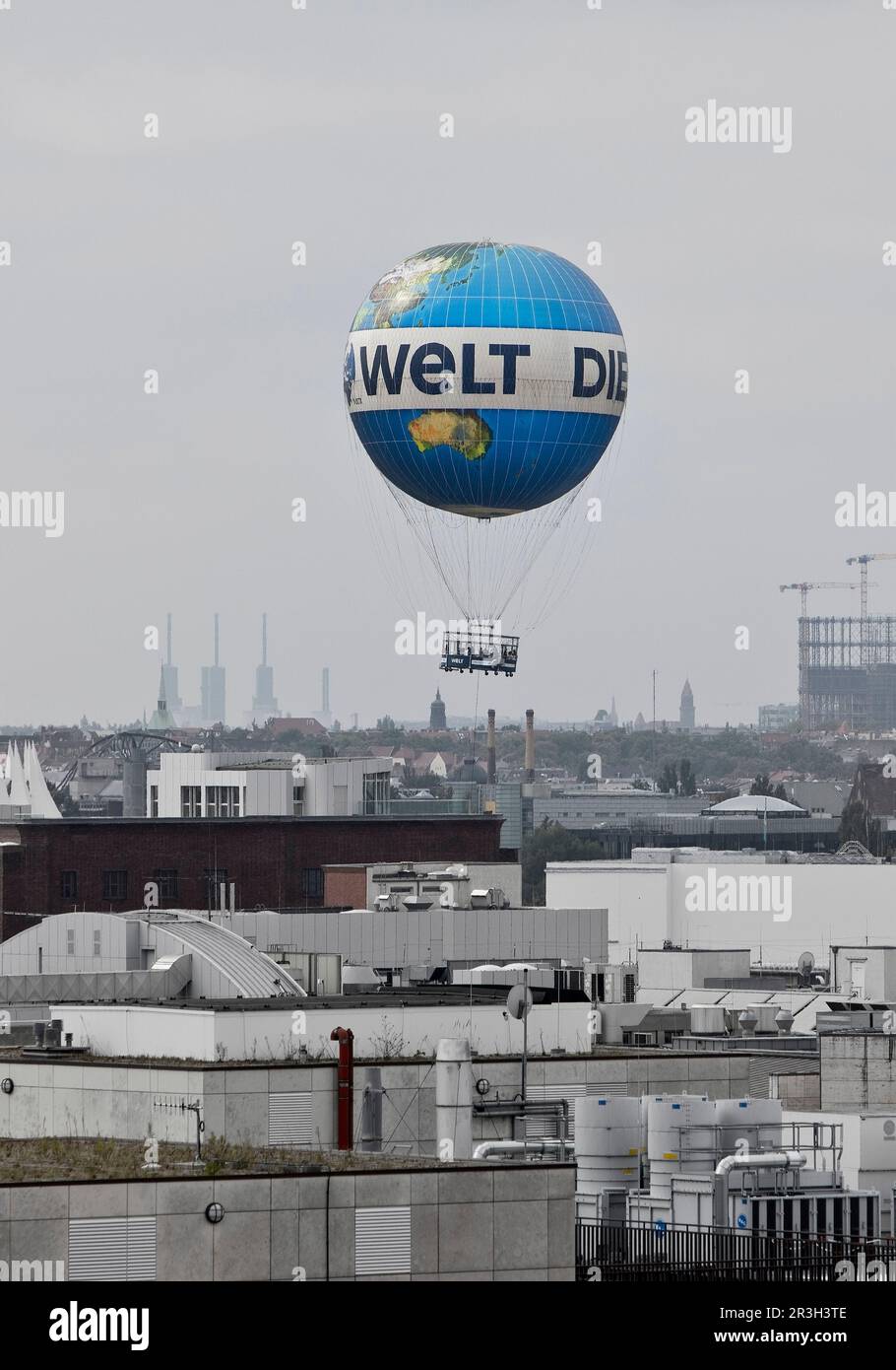 Berlin Welt balloon, captive balloon in the sky over the roofs, Berlin ...