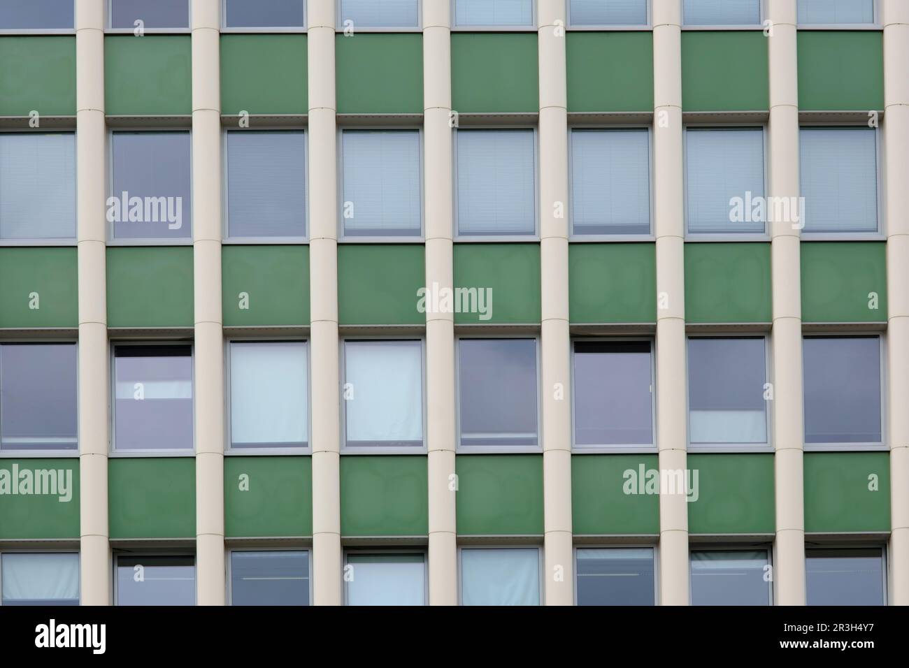 Green facade with windows Stock Photo - Alamy