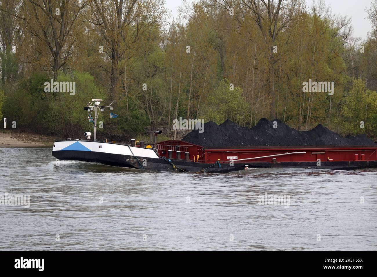 Cargo ship with coal Stock Photo - Alamy