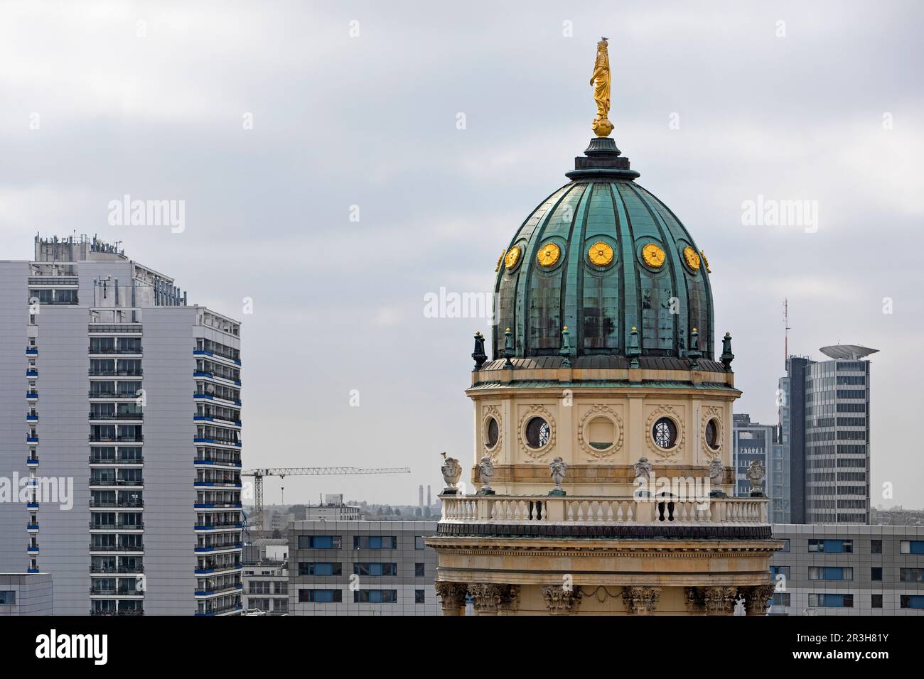 The domed tower of the German Cathedral in front of newly built ...