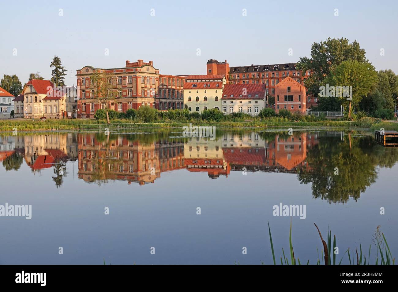 Dosse pond and old buildings in Wittstock Stock Photo - Alamy