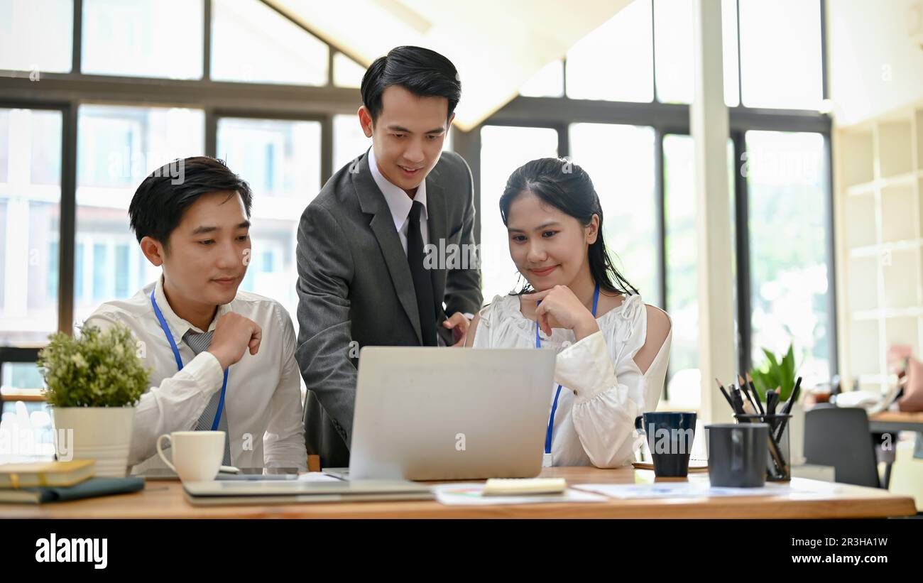 A professional and smart millennial Asian male boss training and ...