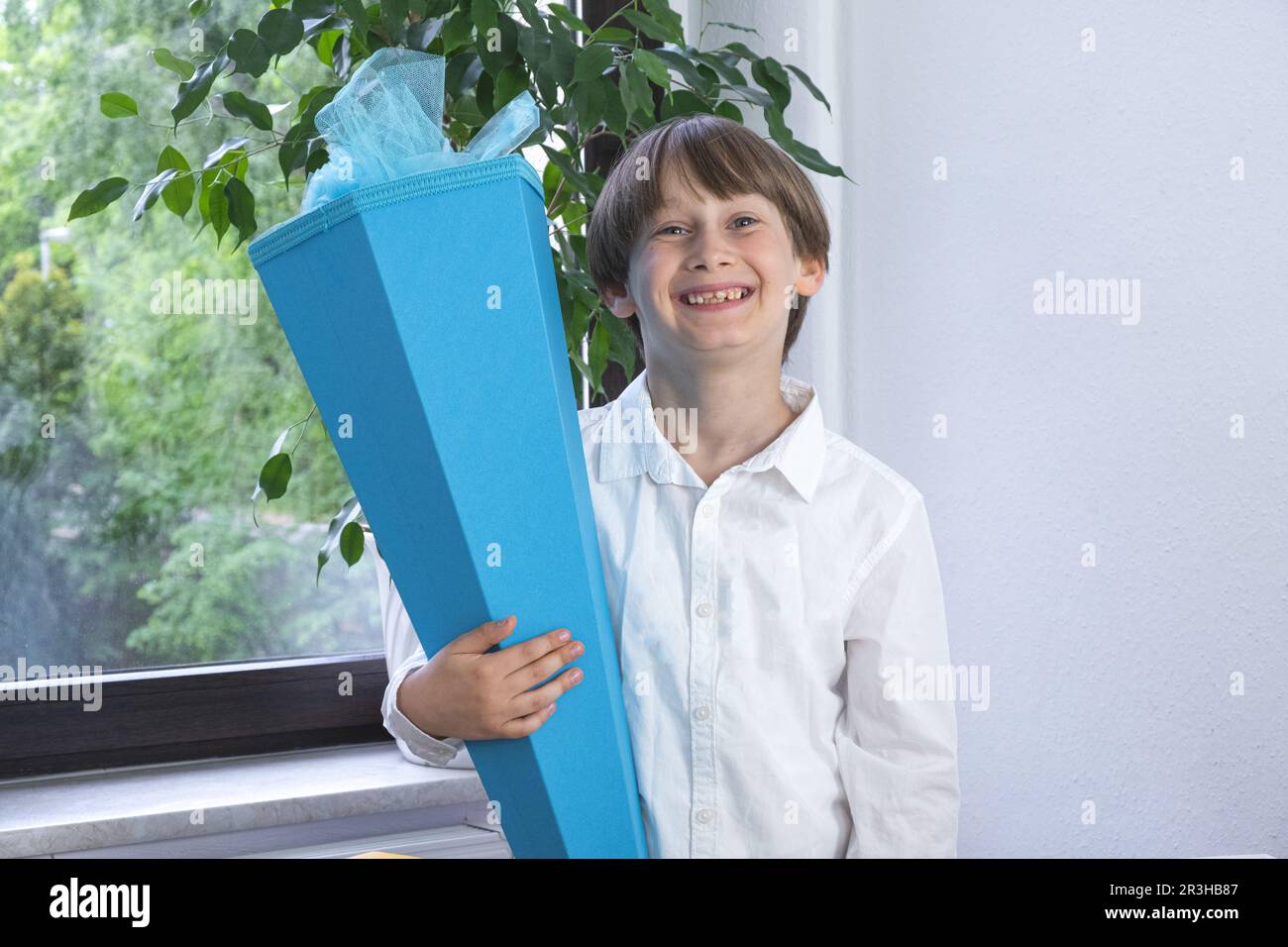 Children with traditional German candy cone on the first day of school ...