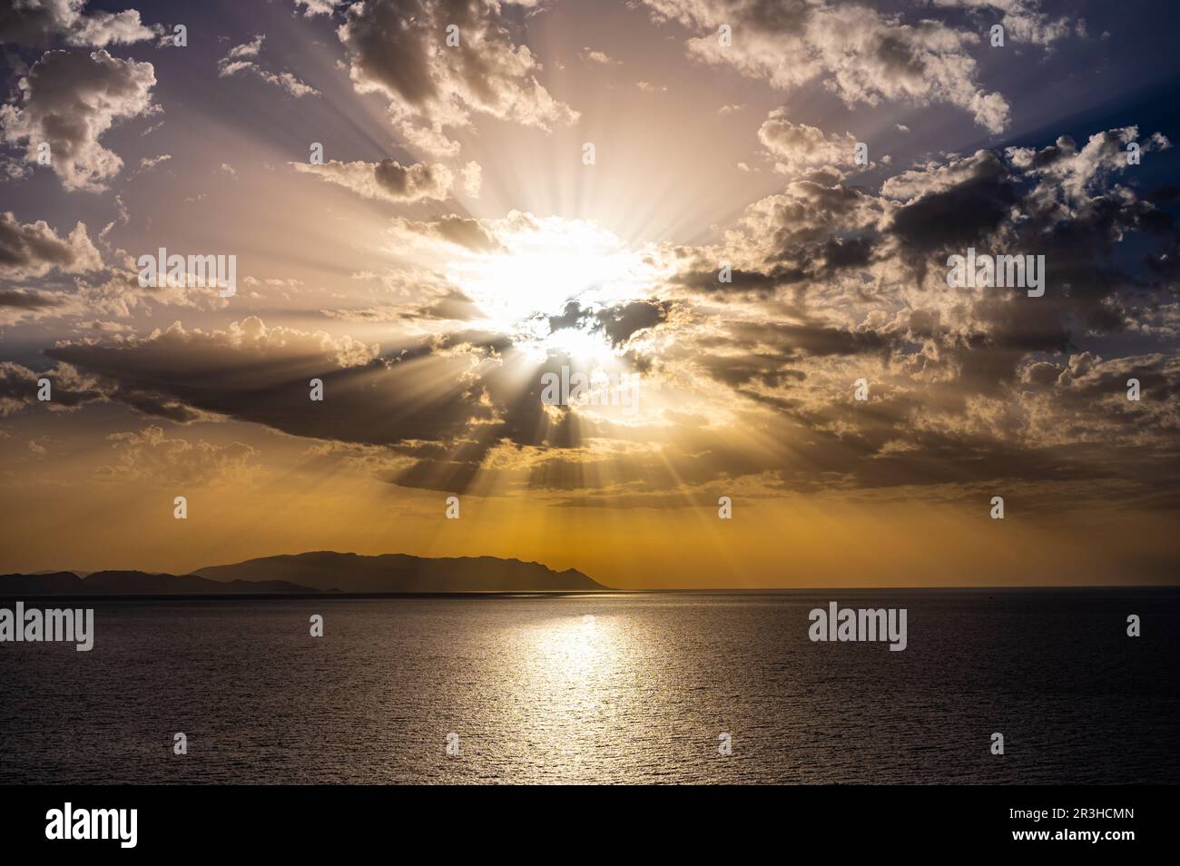 Sun rays through the clouds Stock Photo - Alamy