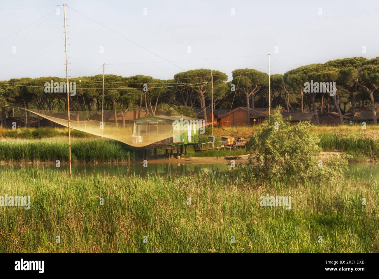 Fishing shack on sea channel Stock Photo - Alamy