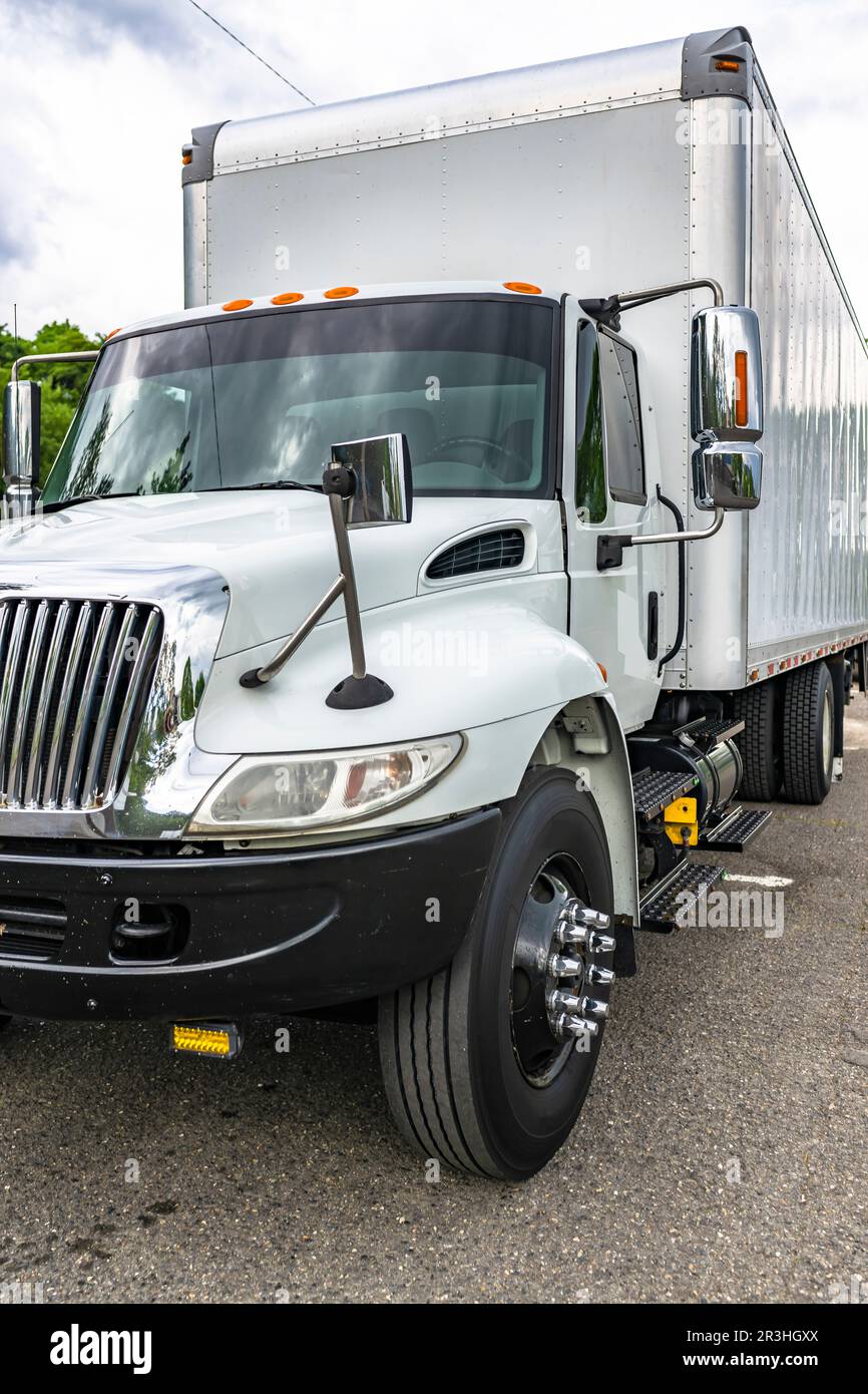 Industrial middle duty day cab white rig semi truck with chrome parts ...