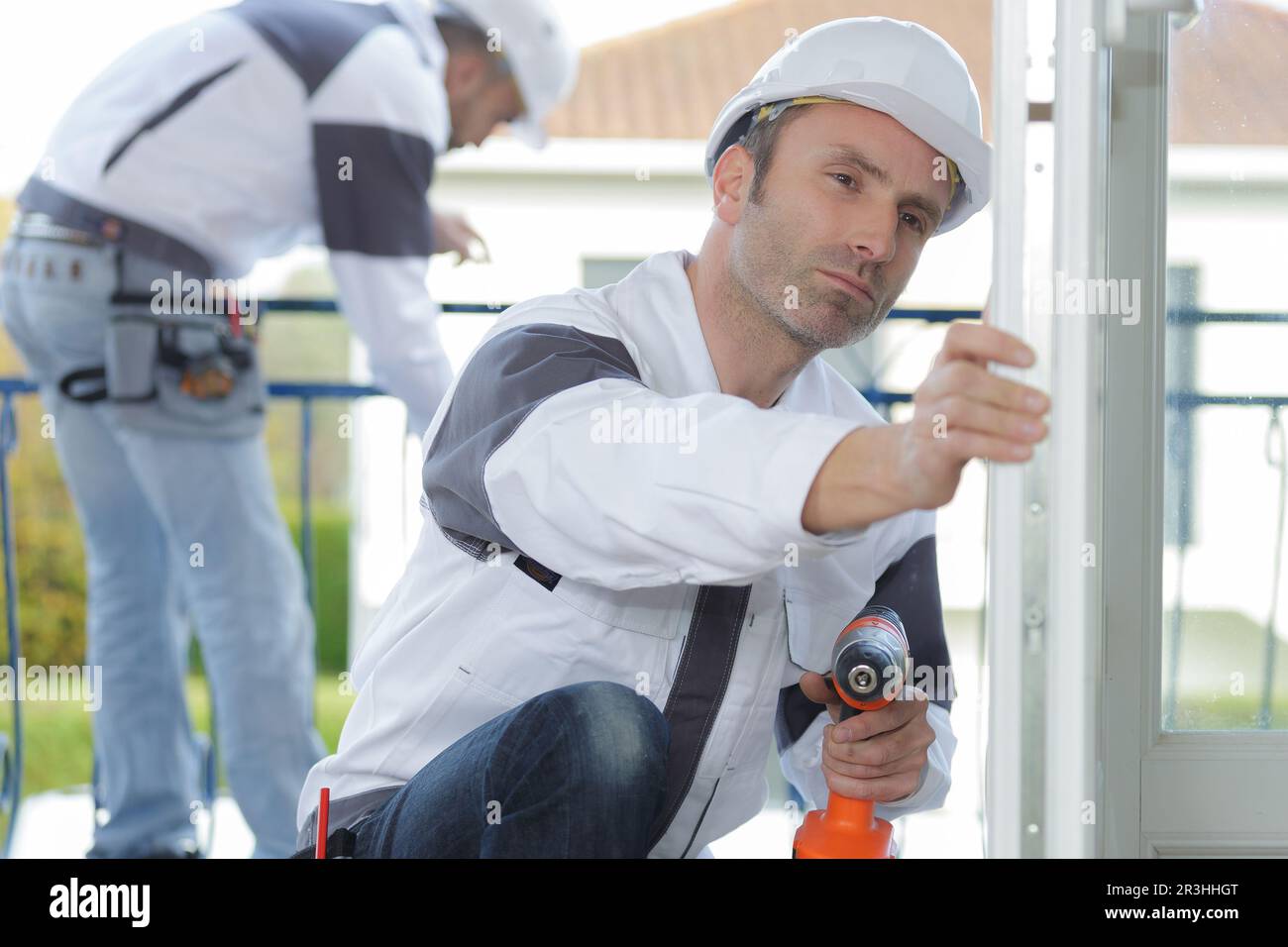 construction workers on a house project Stock Photo - Alamy