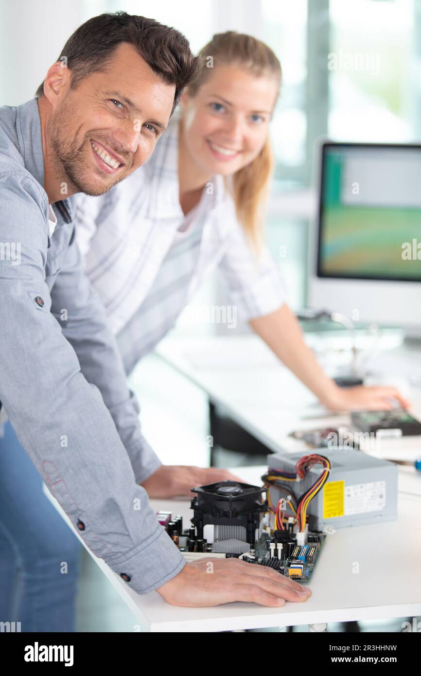woman repairing computer part in service center Stock Photo - Alamy
