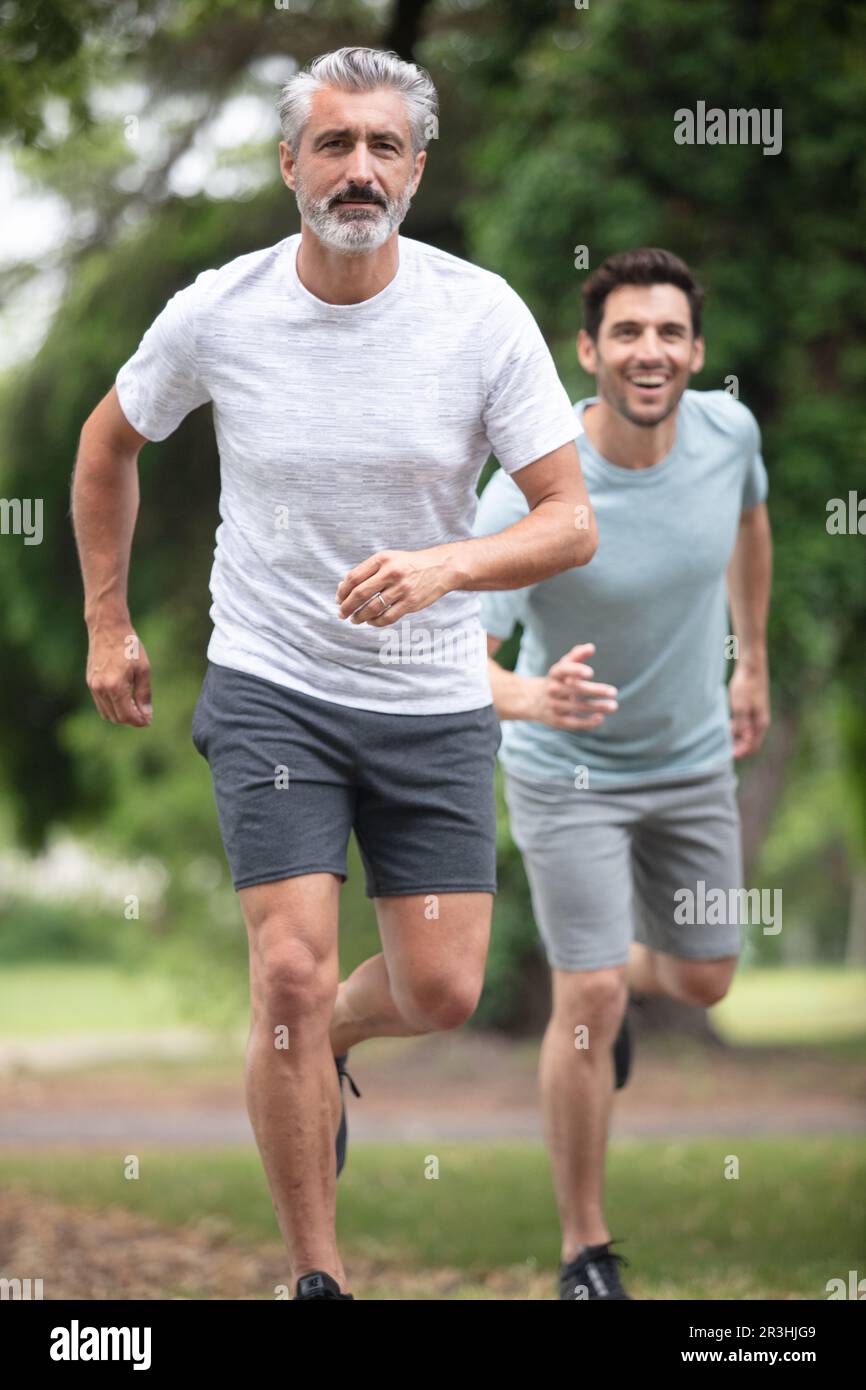 Father son jogging park hi-res stock photography and images - Alamy