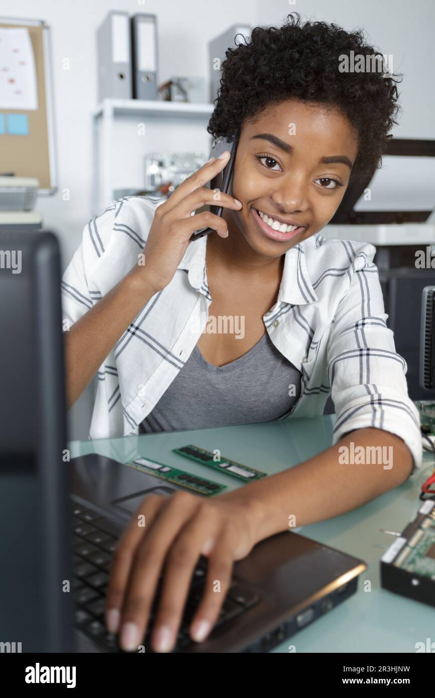 happy female student using cell phone Stock Photo - Alamy