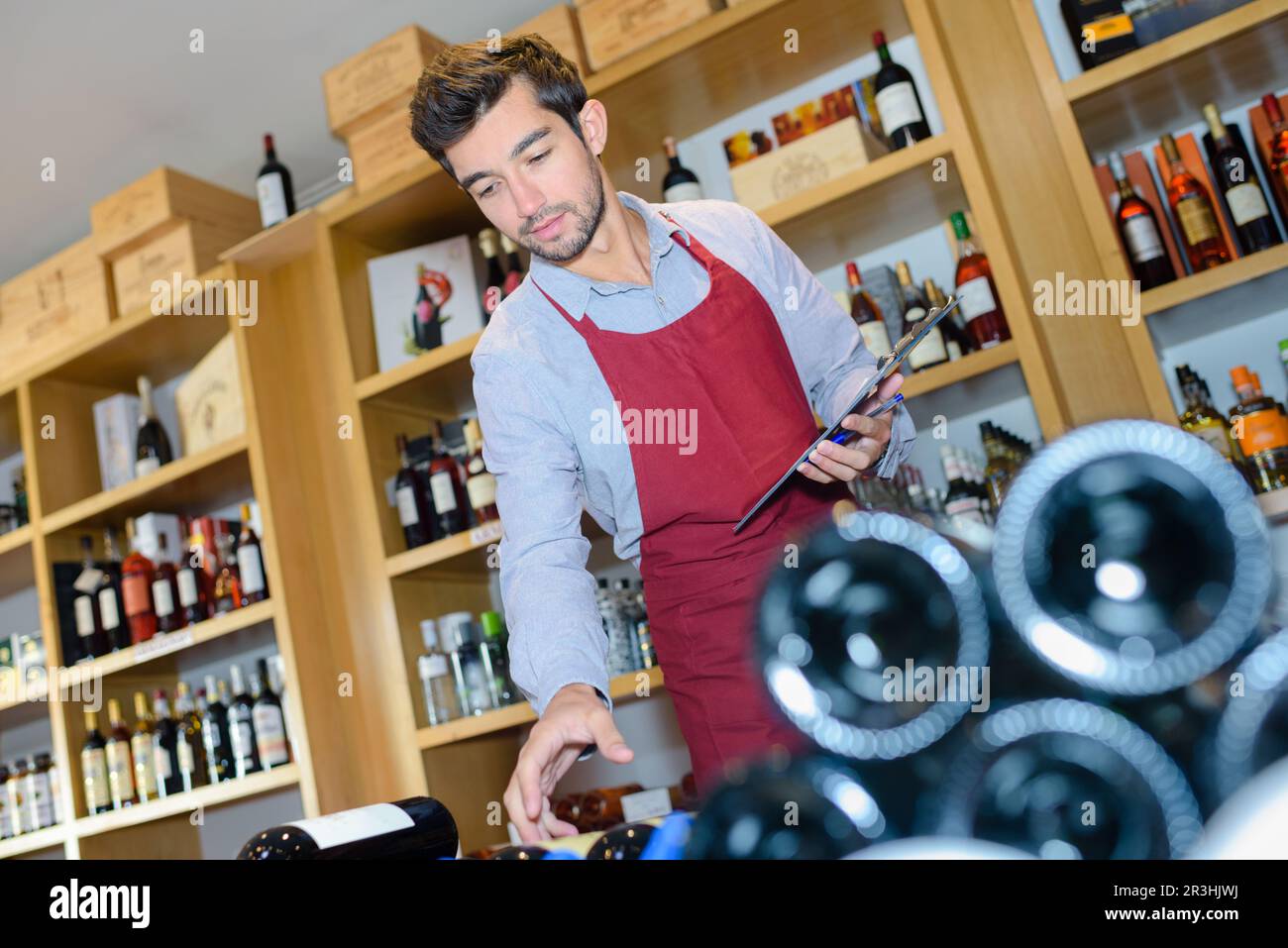 Professional male sommelier checking hi-res stock photography and ...